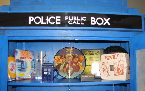 A bookcase shaped like a blue UK police call box - Omnium Design